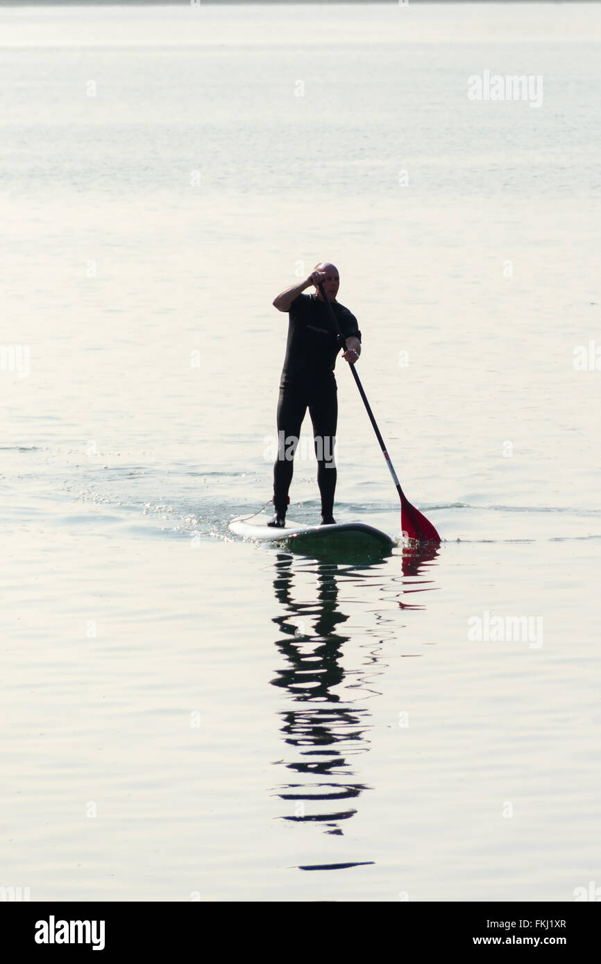 Upright surfboard standing on beach hi-res stock photography and images ...