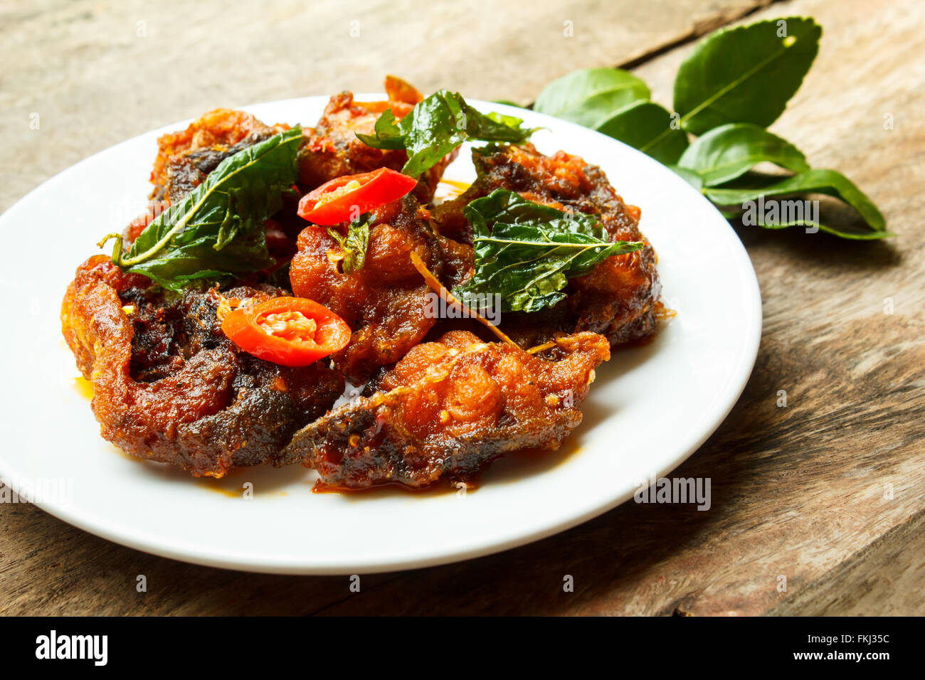 phad phed pla duk thod krob (stir fried deep fried catfish with curry ...