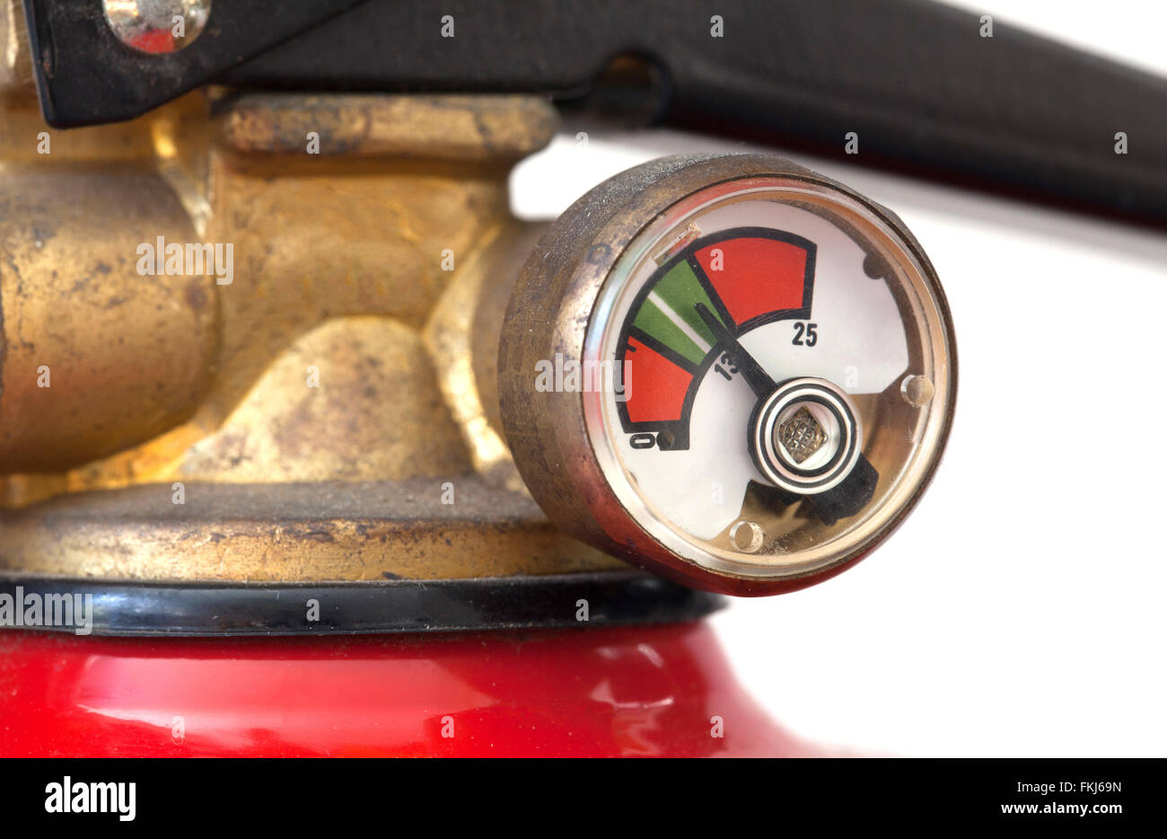 Dusty fire extinguisher fully charged, selective focus, isolated on ...