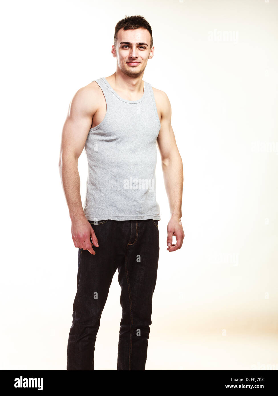 Handsome muscled sporty fit man. Portrait of young muscular guy in ...