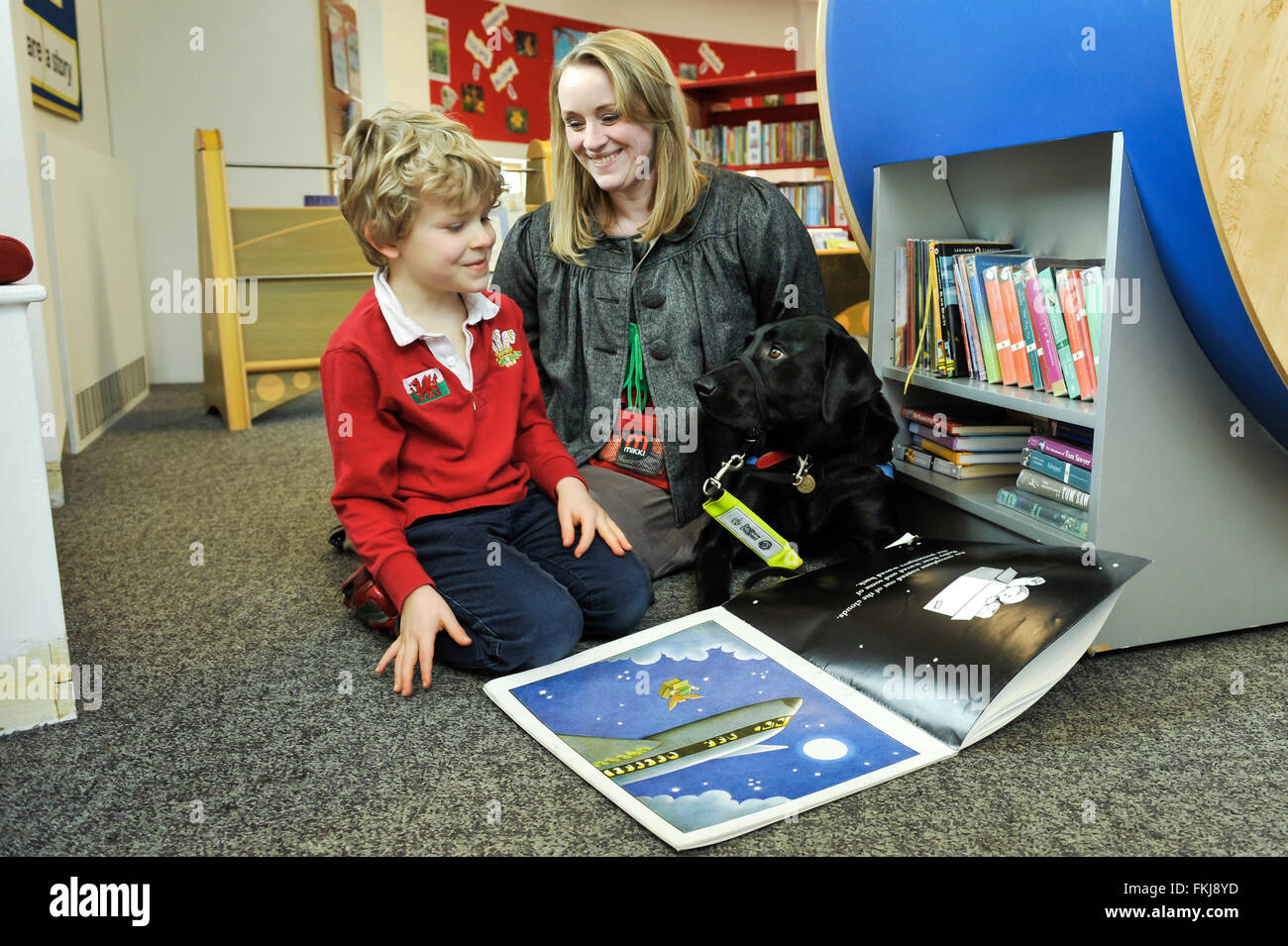 Guide dog for Autistic Son Marcus at the library with Ivan. Marcus Butt ...