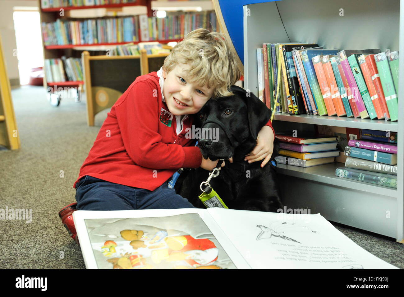 Guide dog for Autistic Son Marcus at the library with Ivan. Marcus Butt ...