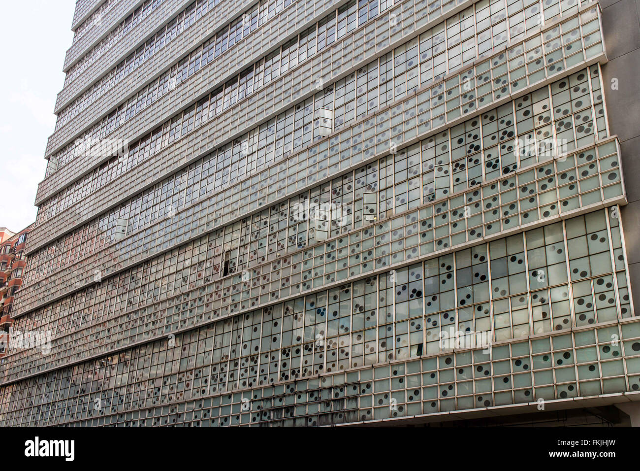 Shanghai, Shanghai, CHN. 7th Mar, 2016. A building covered with bullet ...