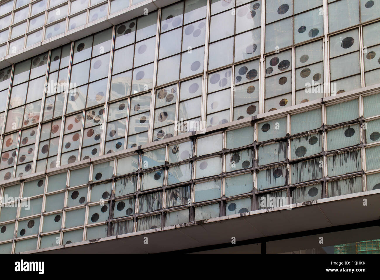 Shanghai, Shanghai, CHN. 7th Mar, 2016. A building covered with bullet ...