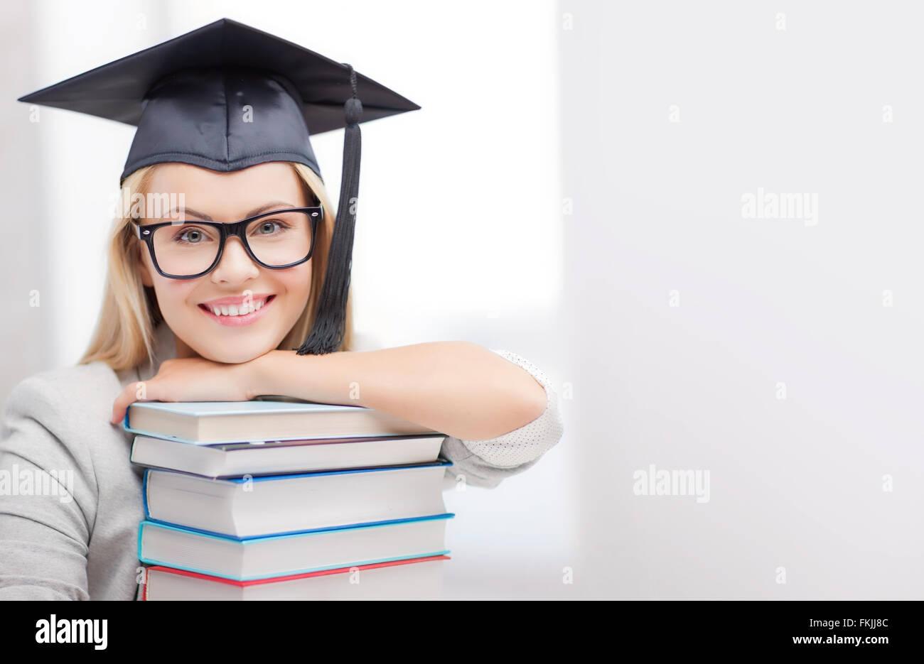 student in graduation cap Stock Photo - Alamy
