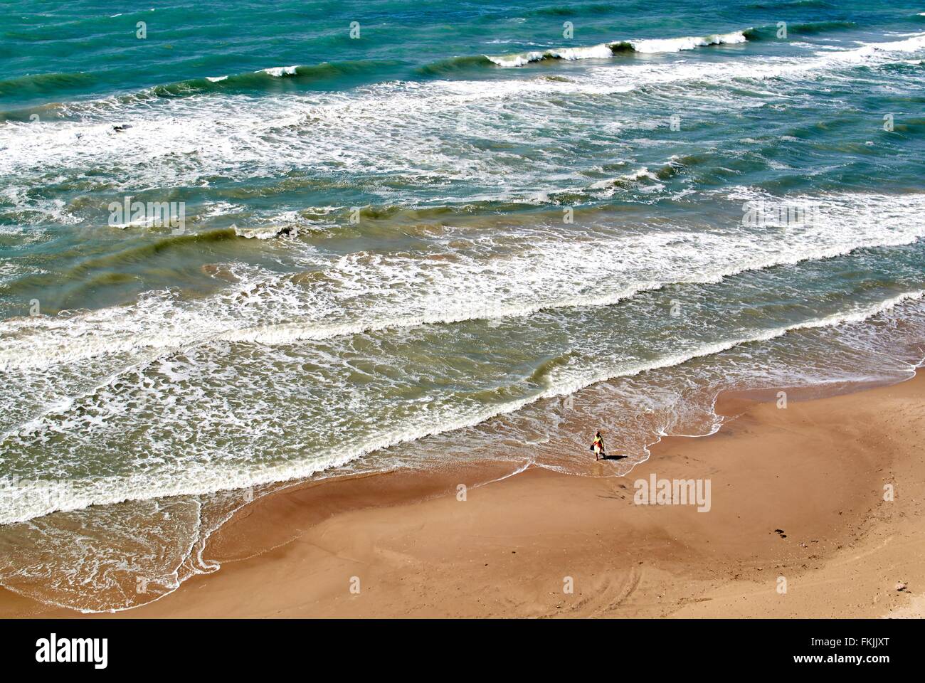 Walker on beach of Lonstrup, Denmark, photo: August 2015 Stock Photo ...