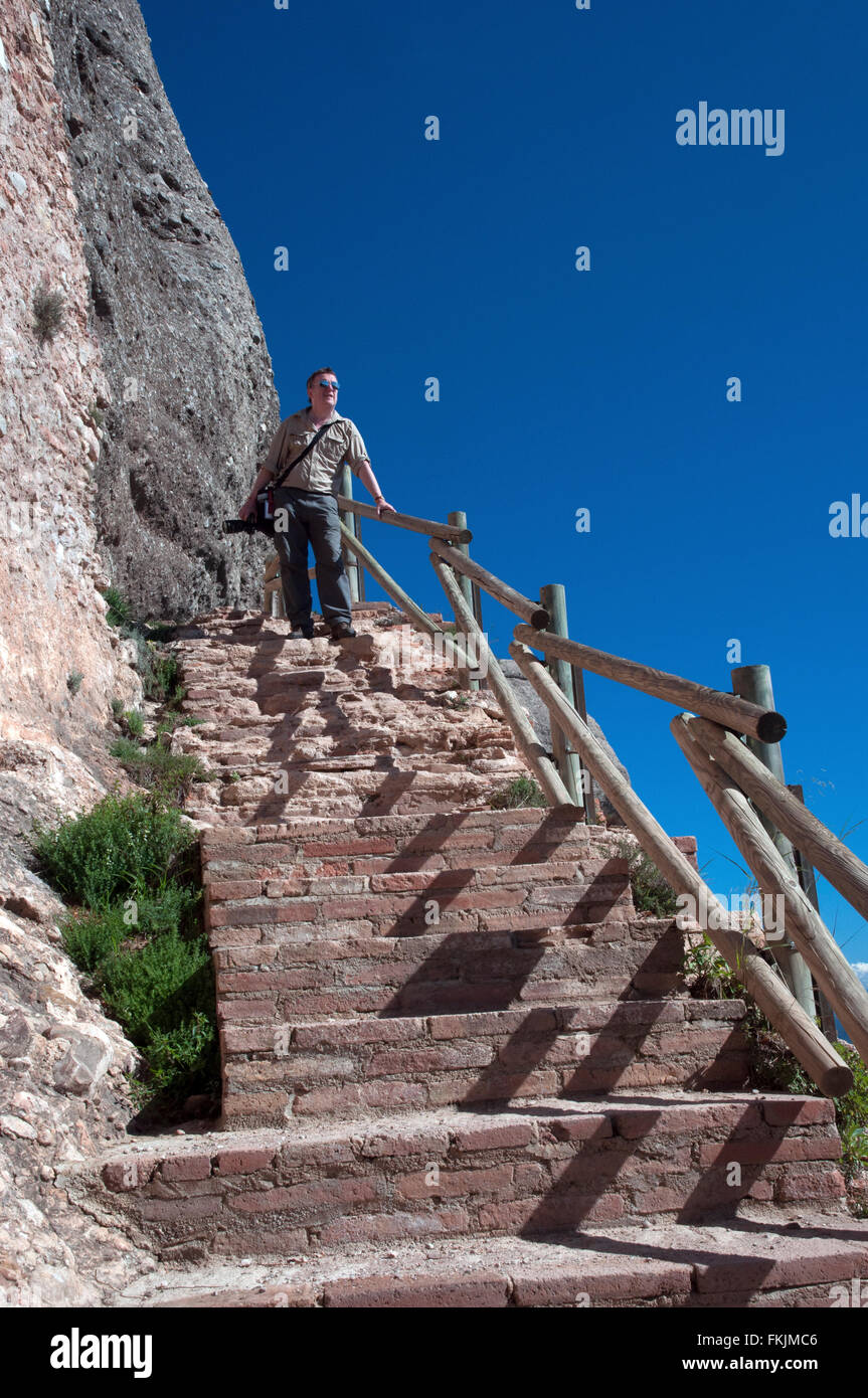 male tourist at top of steps on montserrat mountain walk Stock Photo ...