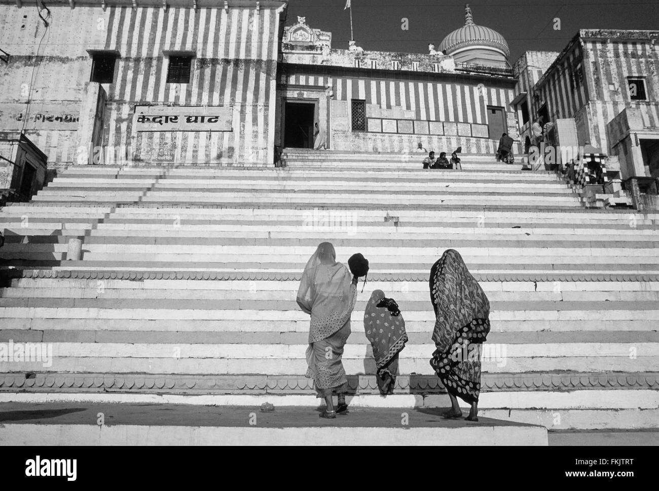 Indian women wearing sarees,saris heading to Hindu temple on ghat ...