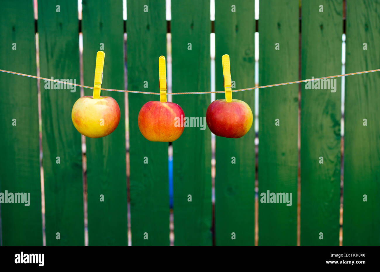 Rope with clothespins hi-res stock photography and images - Alamy