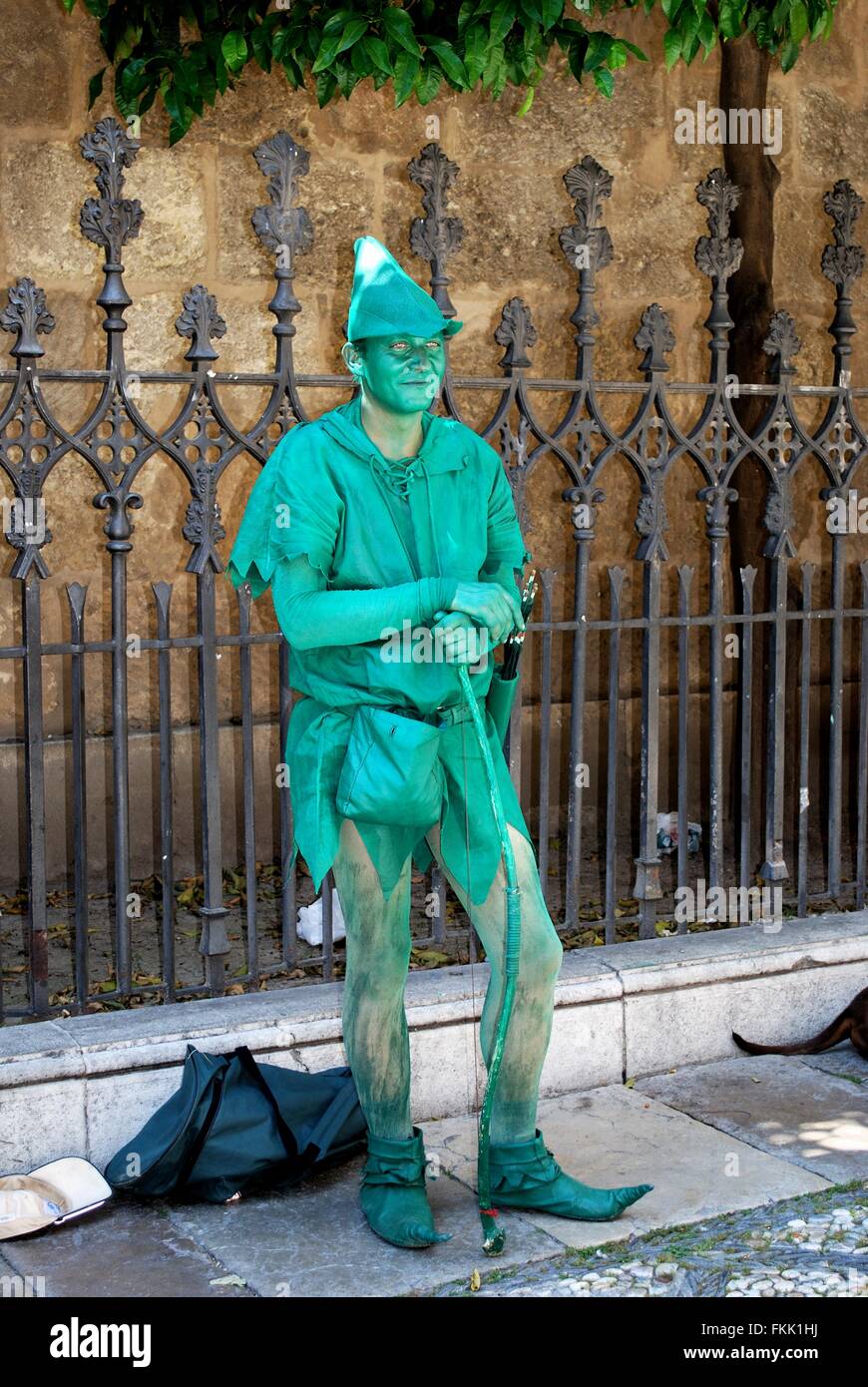 Robin Hood living statue outside the Capilla Real, Granada, Granada ...