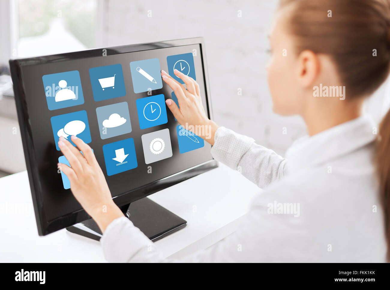 businesswoman with computer touchscreen in office Stock Photo - Alamy
