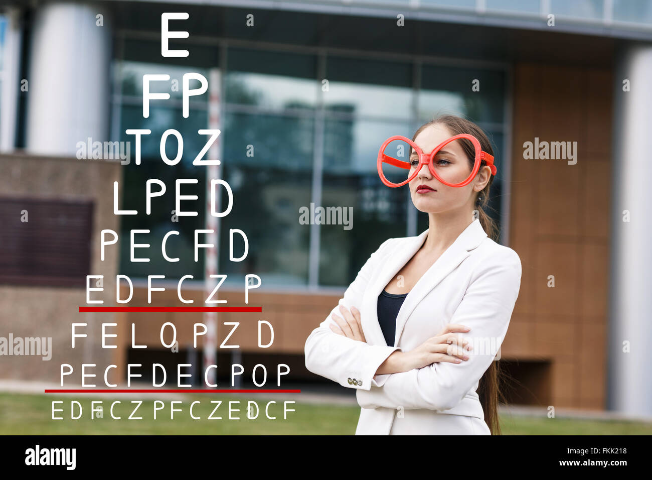 Doctor recording the results an eyesight test Stock Photo - Alamy