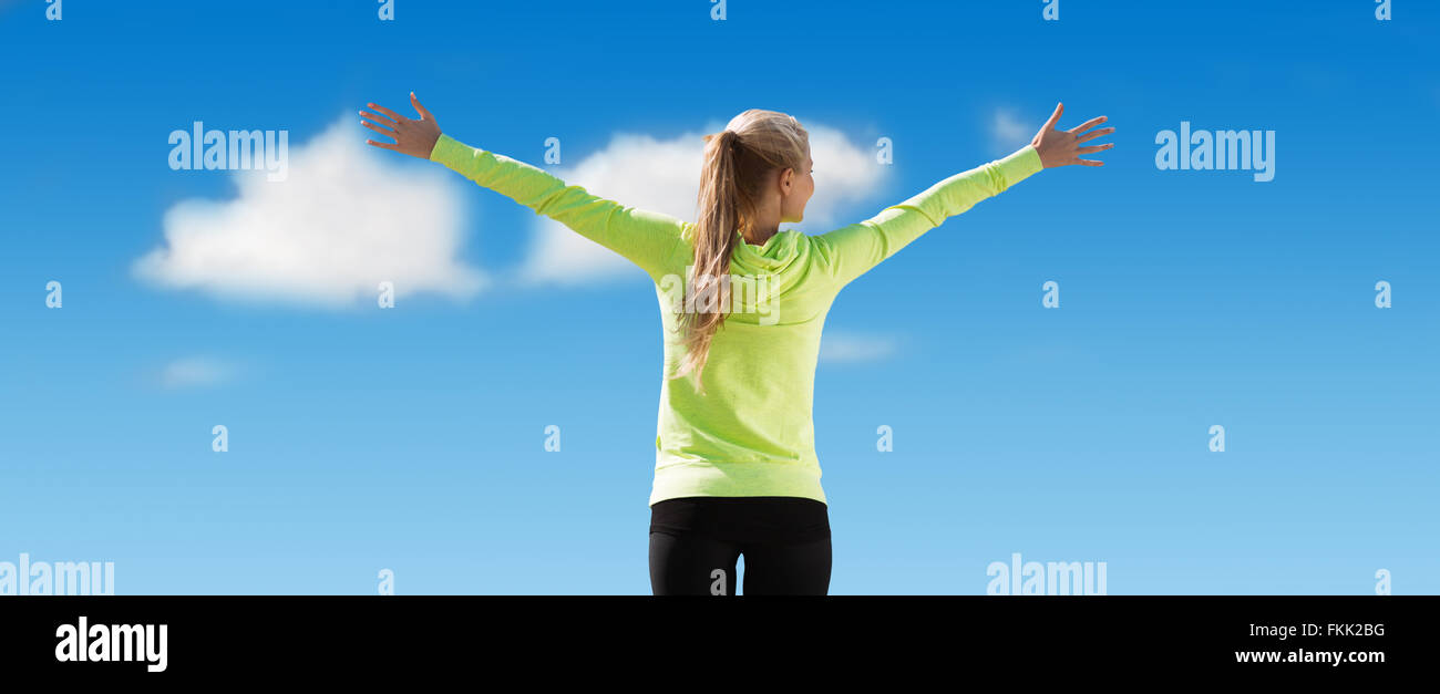 happy sporty woman enjoying sun and freedom Stock Photo - Alamy