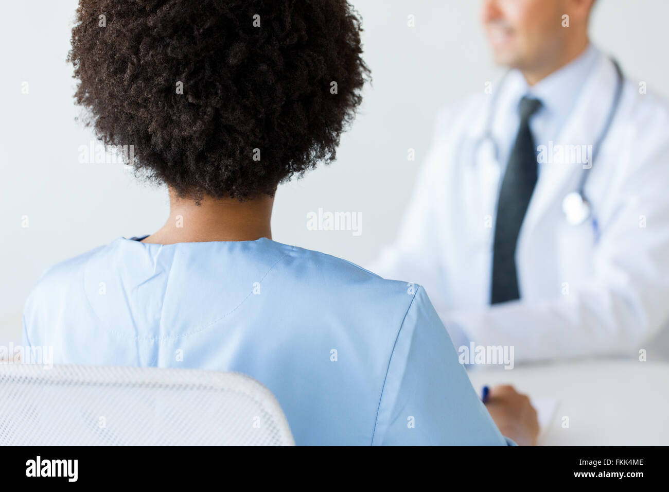 close up of african doctor at hospital from back Stock Photo - Alamy