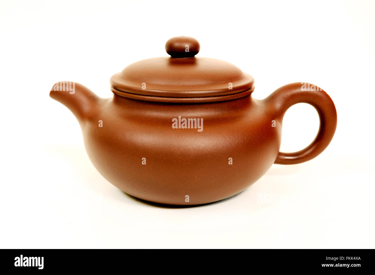 Traditional chinese tea pot on a white background Stock Photo - Alamy