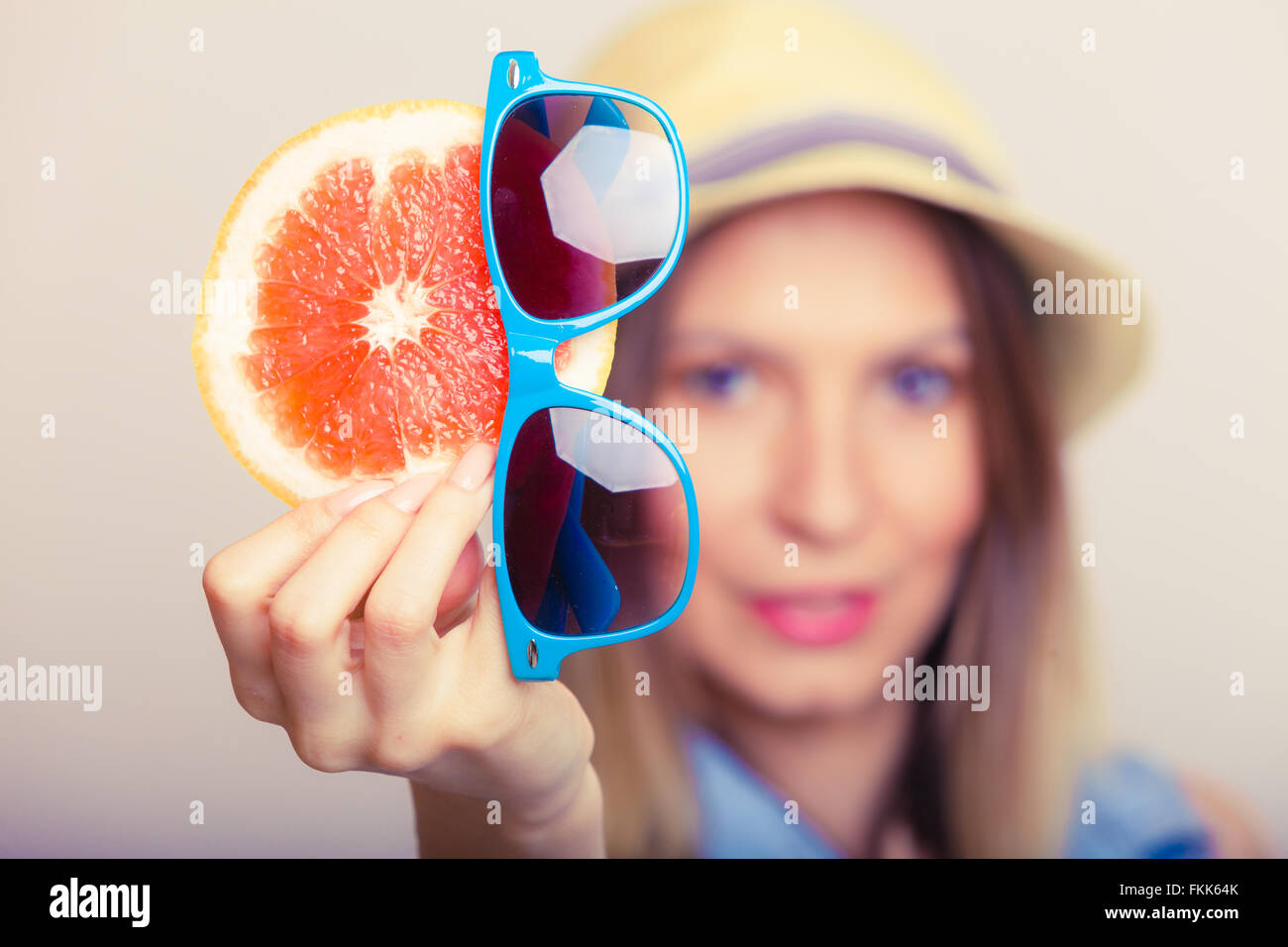 Summer girl holding grapefruit. Happy tourist enjoyed vacation Stock ...