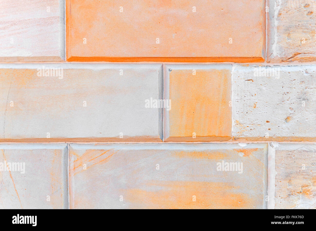 Orange stone wall Stock Photo - Alamy