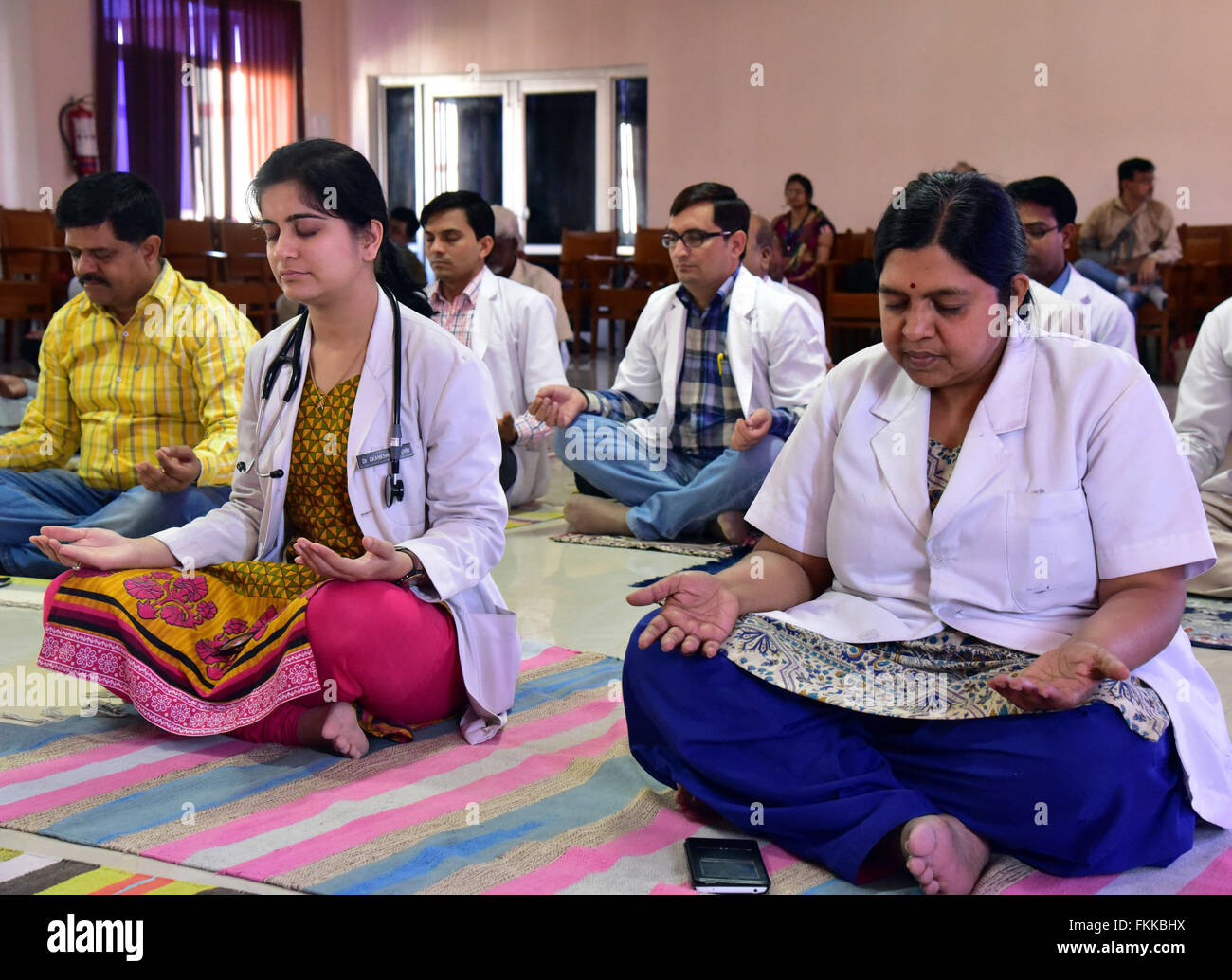 Bikaner, India. 09th Mar, 2016. Doctor and cancer patients perform yoga ...