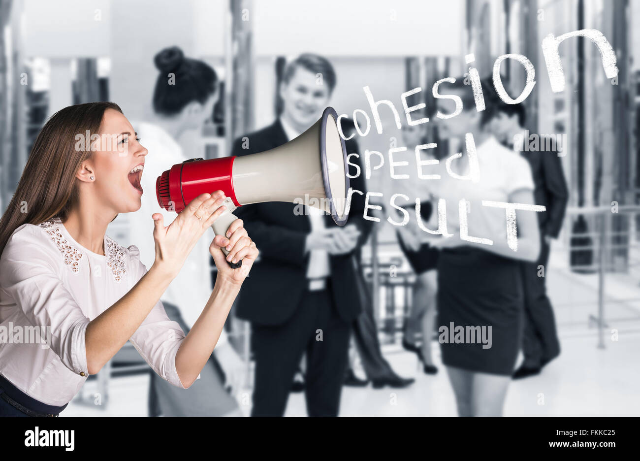 Business woman scream to megaphone Stock Photo - Alamy