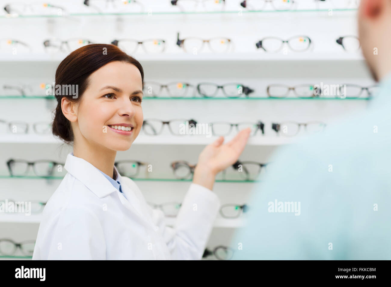 Optician showing glasses man hi-res stock photography and images - Alamy