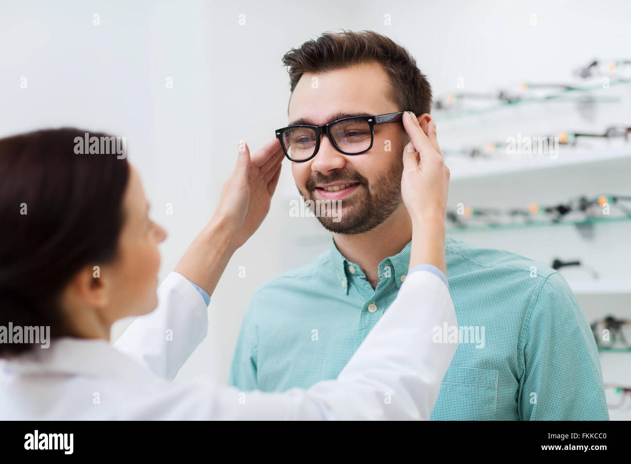 Putting on glasses hi-res stock photography and images - Alamy