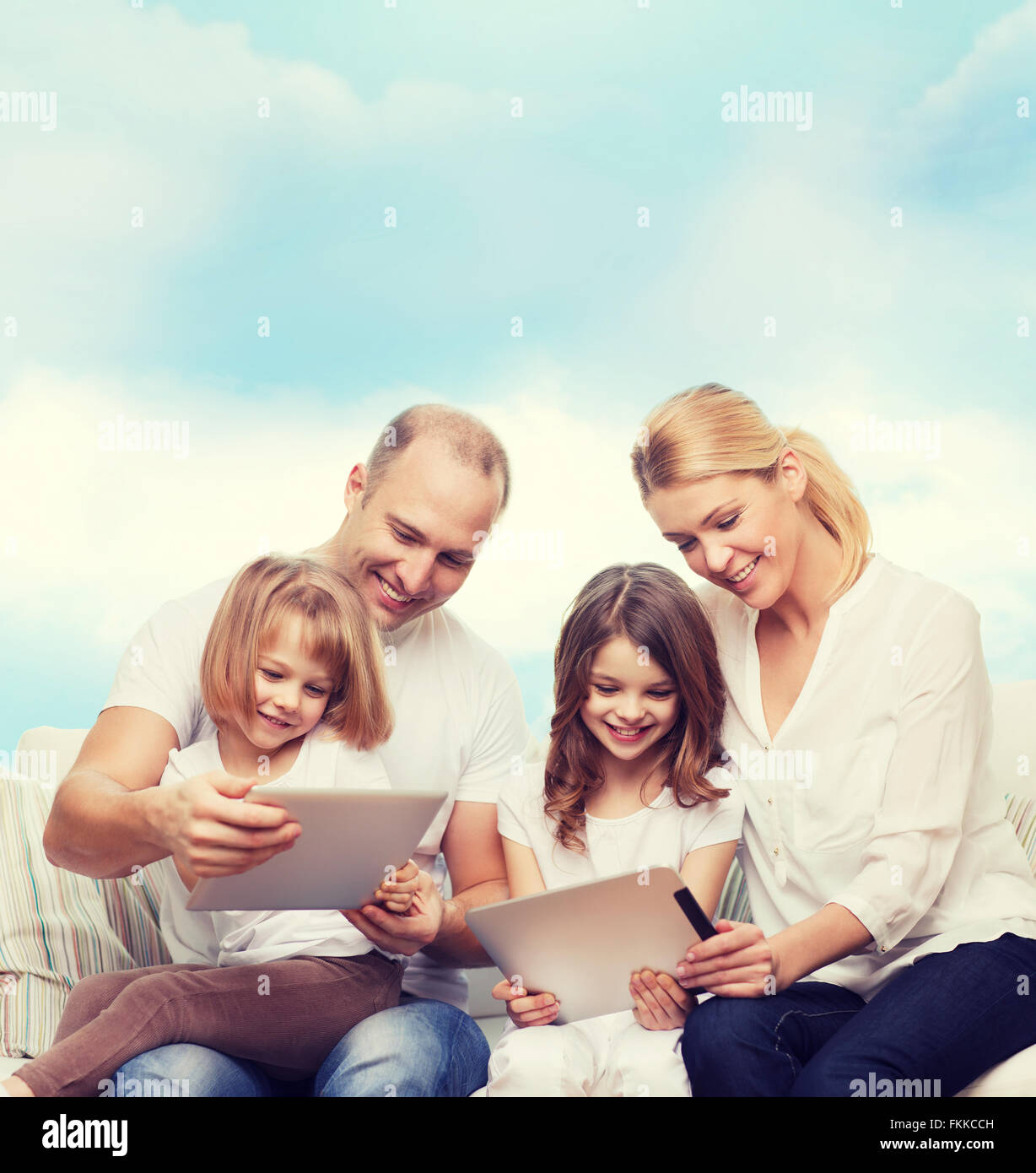 happy family with tablet pc computers Stock Photo - Alamy
