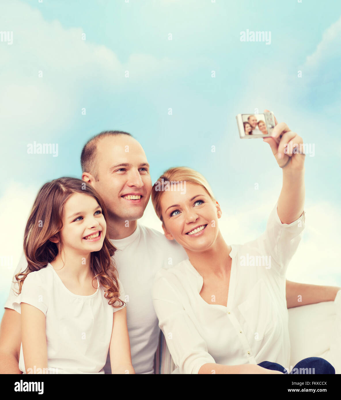 happy family with camera at home Stock Photo - Alamy