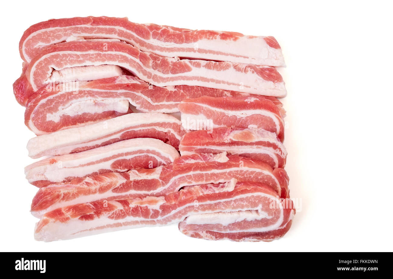 Top view of seven slices of raw pork belly meat isolated on white Stock ...