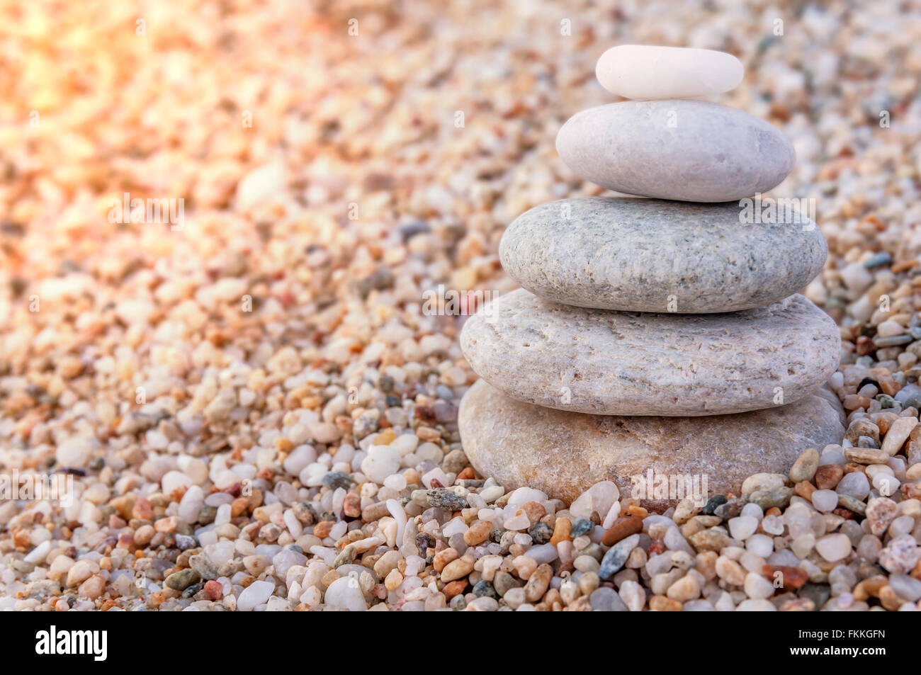 Stack of zen stones on beach Stock Photo - Alamy
