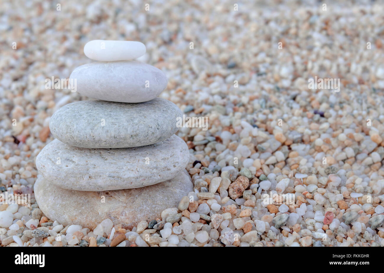 Stack of zen stones on beach Stock Photo - Alamy