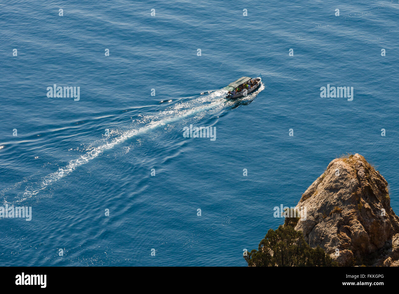 top-down view on the passenger boat floating along the shore Stock ...