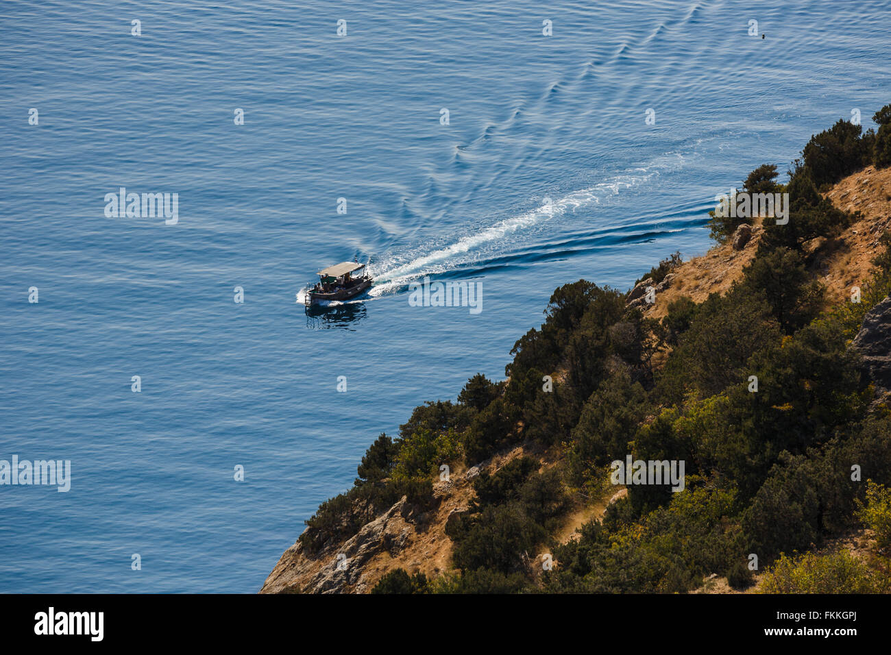 top-down view on the passenger boat floating along the shore Stock ...