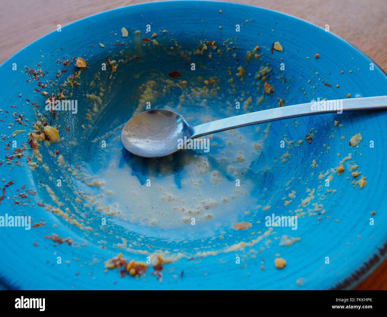 Empty plate after eating peanut flaked ice cream Stock Photo - Alamy