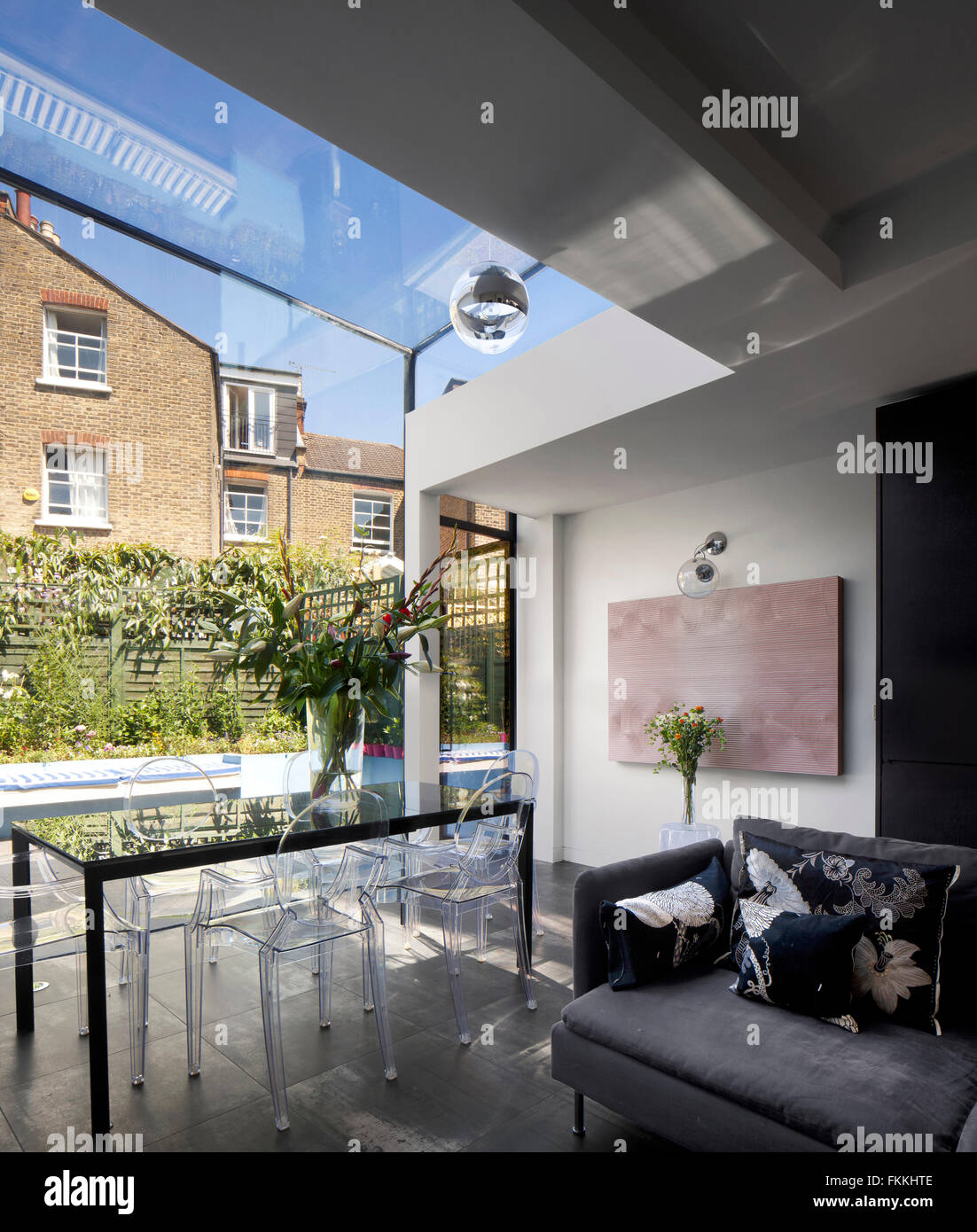 A view of an open plan living room and lounge in a modern building, a ...