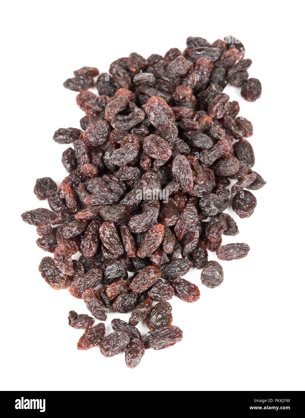 Heap of raisins close up over white background Stock Photo - Alamy