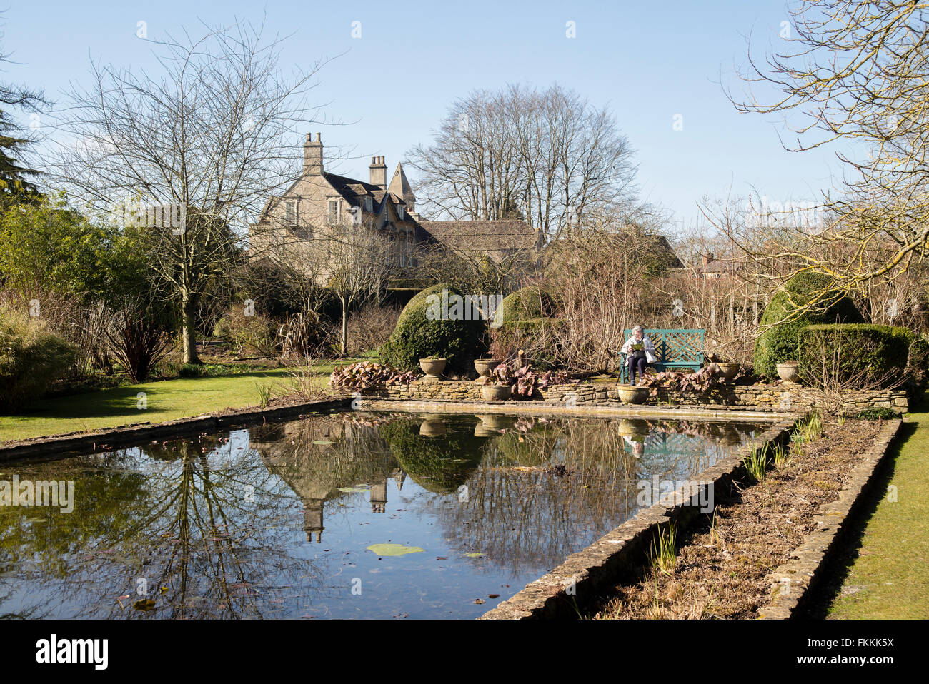 Bare bones of winter leaves an English garden bereft of life in the ...