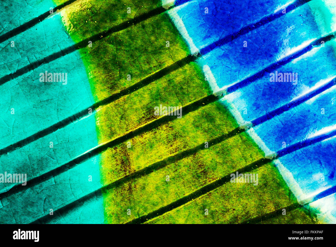 Closeup shot of glazed green and blue ceramics texture Stock Photo - Alamy
