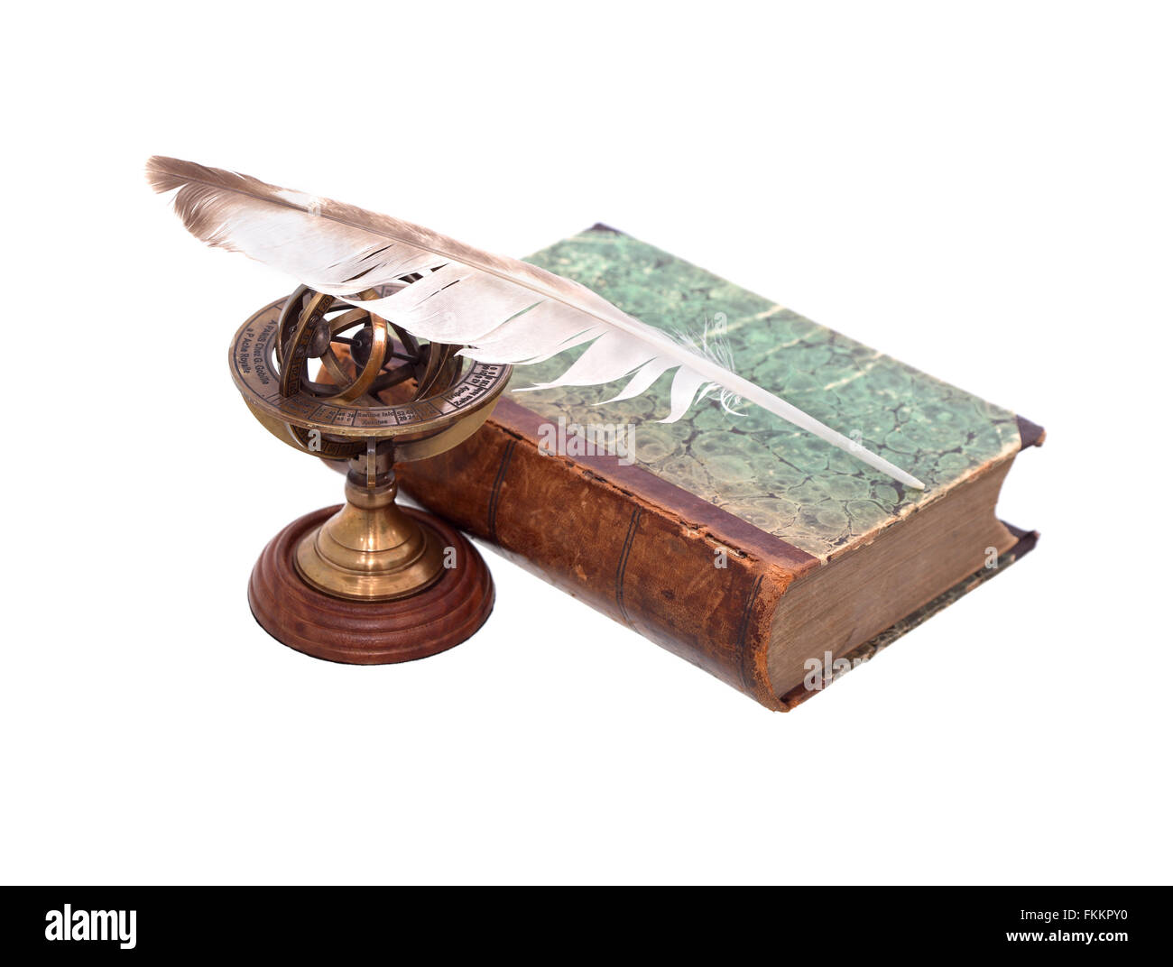 Science concept. Quill pen on old book near globe on white background ...