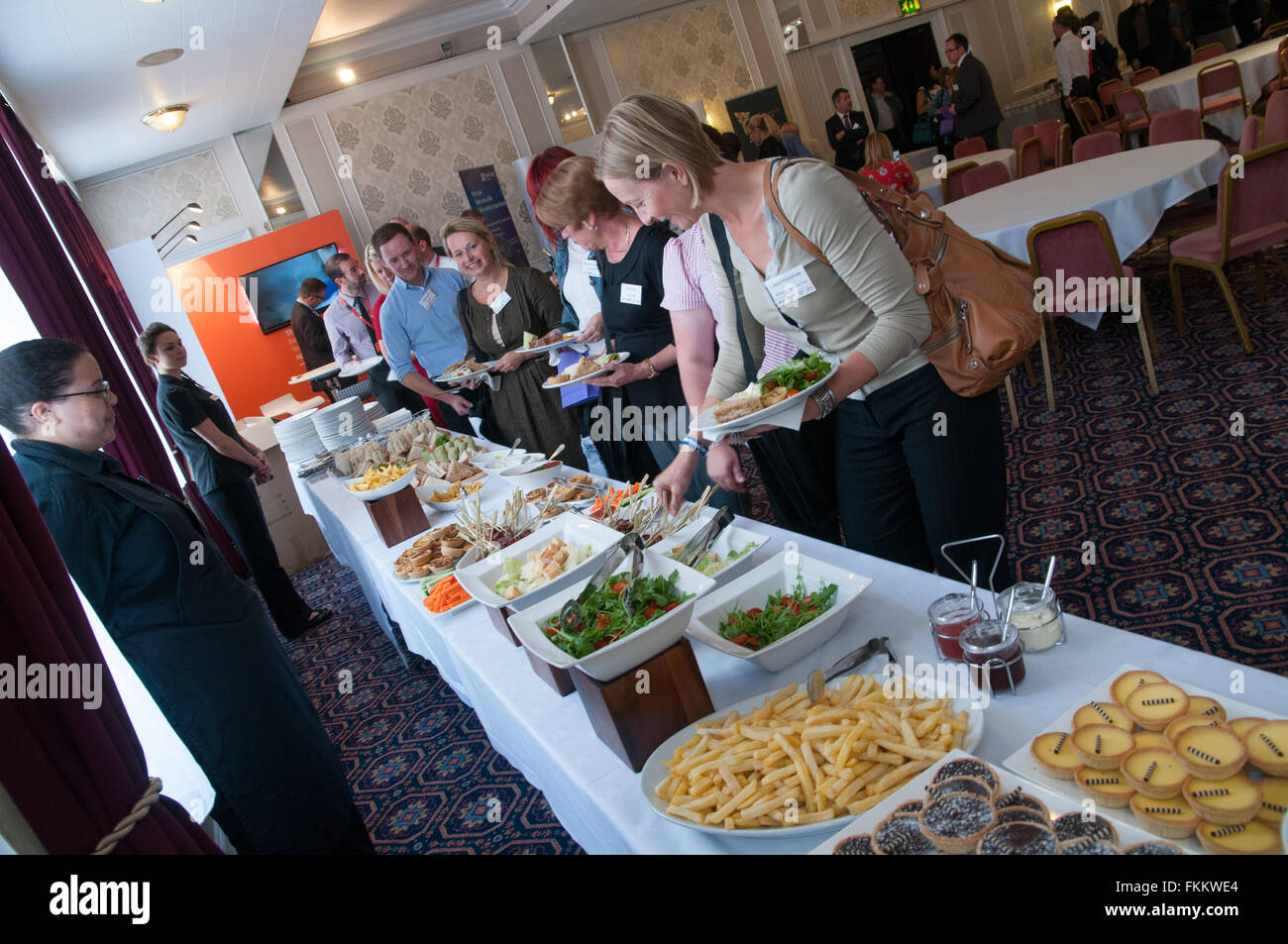 Buffet table business conference delegates hi-res stock photography and ...