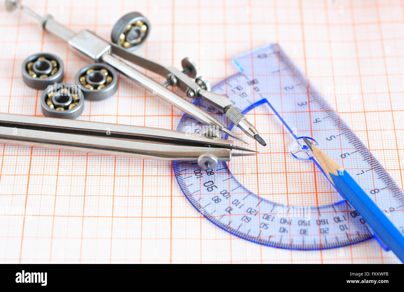 Engineering concept. Drawing instrument and rulers on graph paper ...