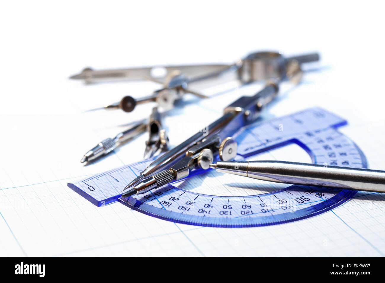 Industrial concept. Drawing instrument and pen on graph paper Stock ...