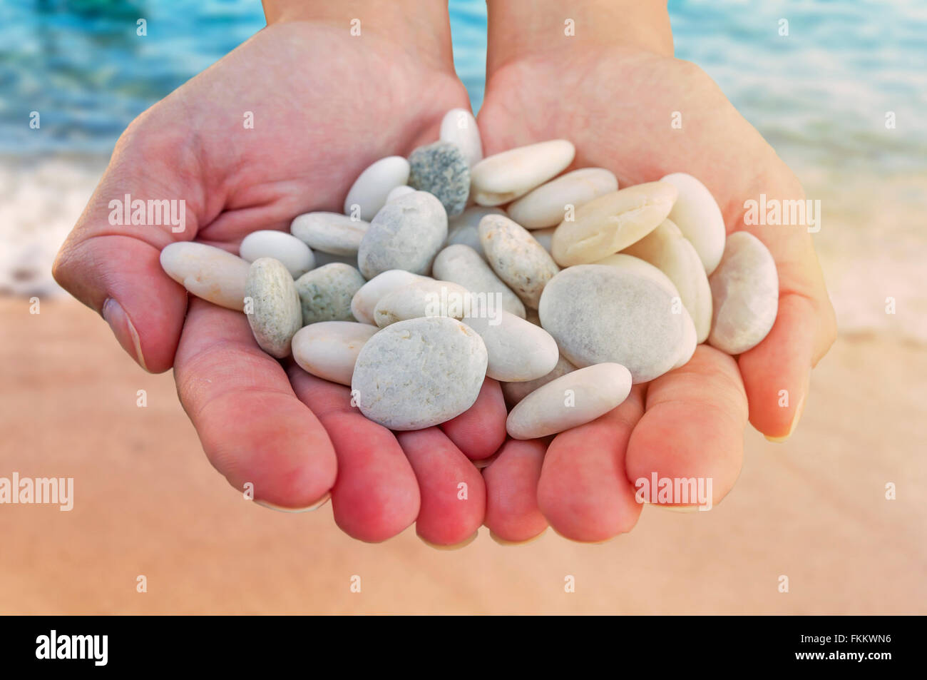 Small pebble on finger hi-res stock photography and images - Alamy