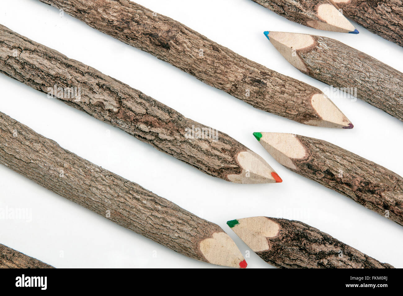 Studio shot above view of sharpened pencil crayons set in rough ...
