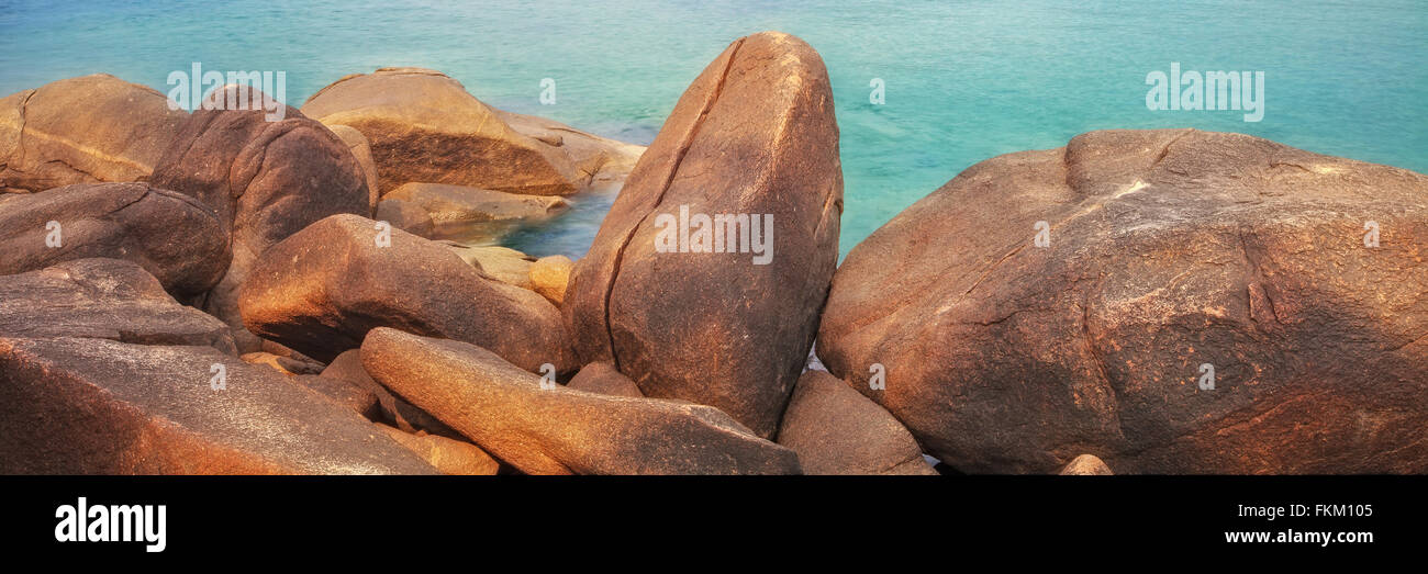 Stones in the ocean Stock Photo - Alamy