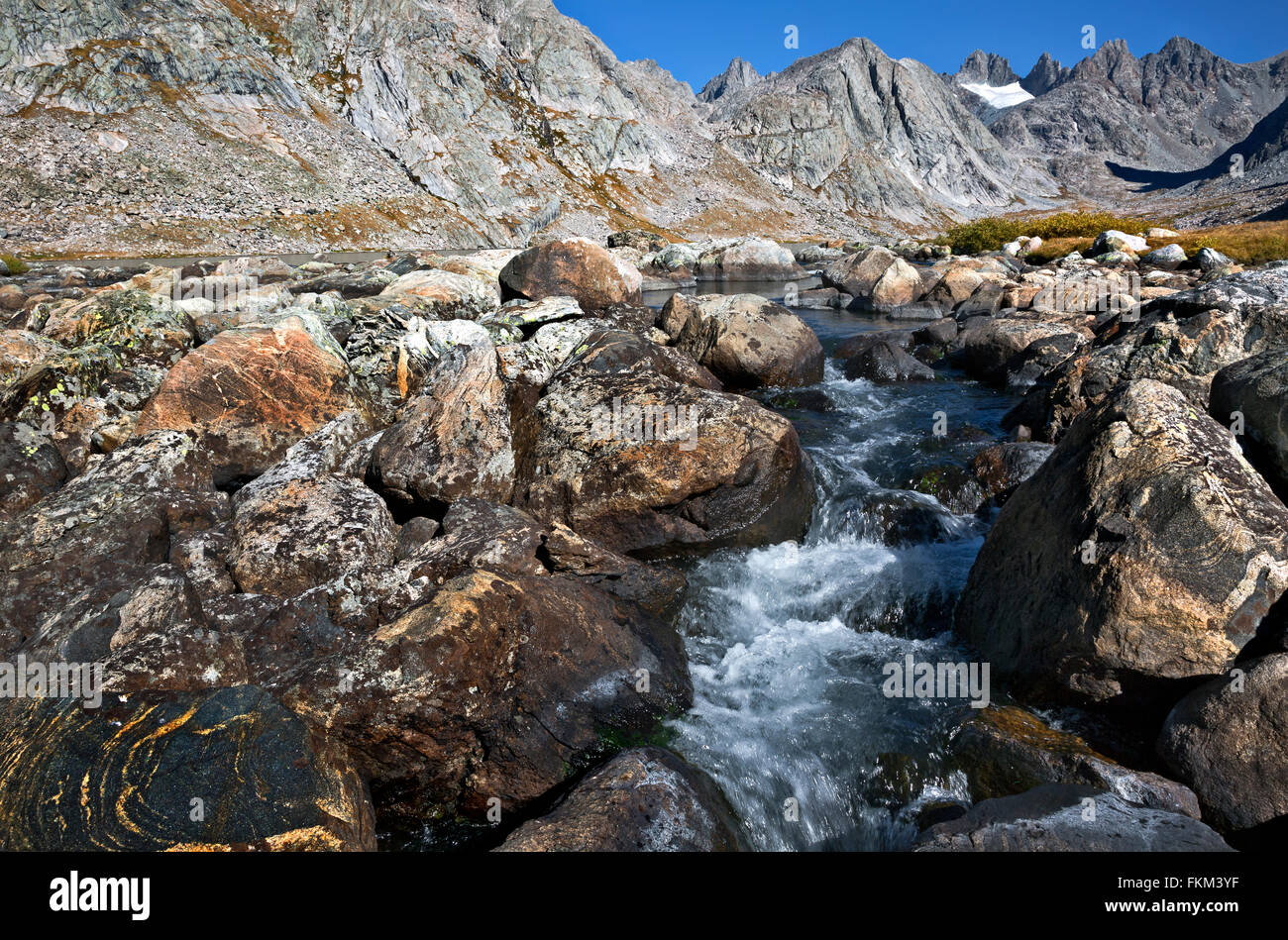 WYOMING - Stream cascading out of Upper Titcomb Lake in the Titcomb ...