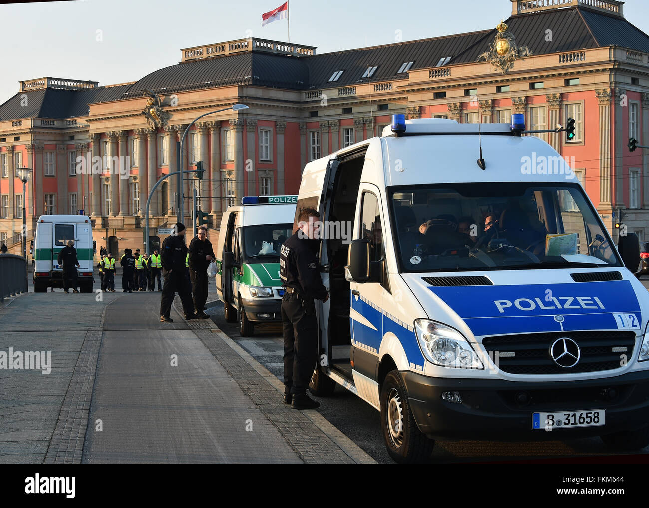 Potsdam, Germany. 9th Mar, 2016. Police vehicles standing in front of ...