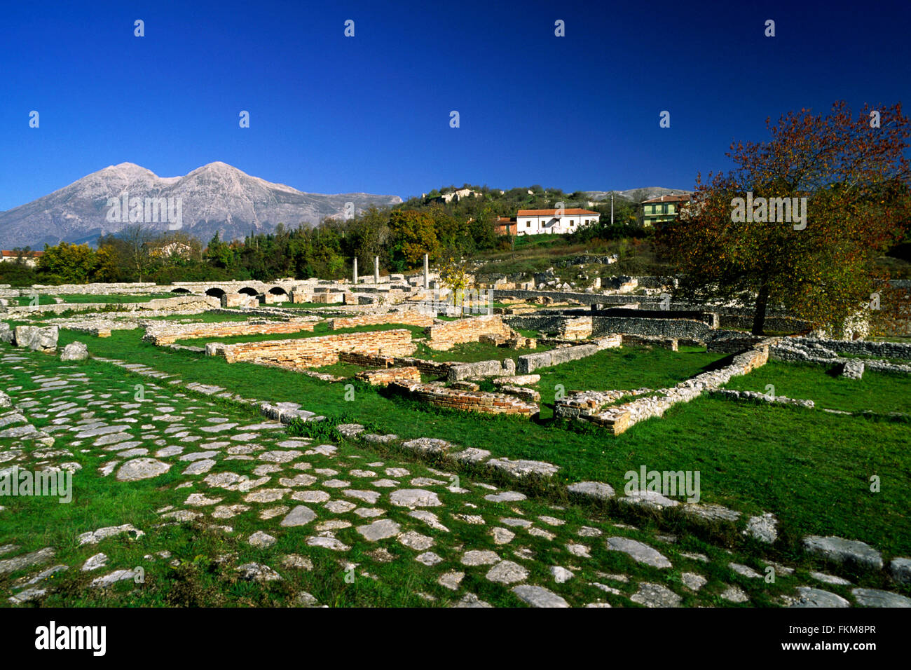 Italy, Abruzzo, Alba Fucens Roman ruins and Mount Velino Stock Photo ...