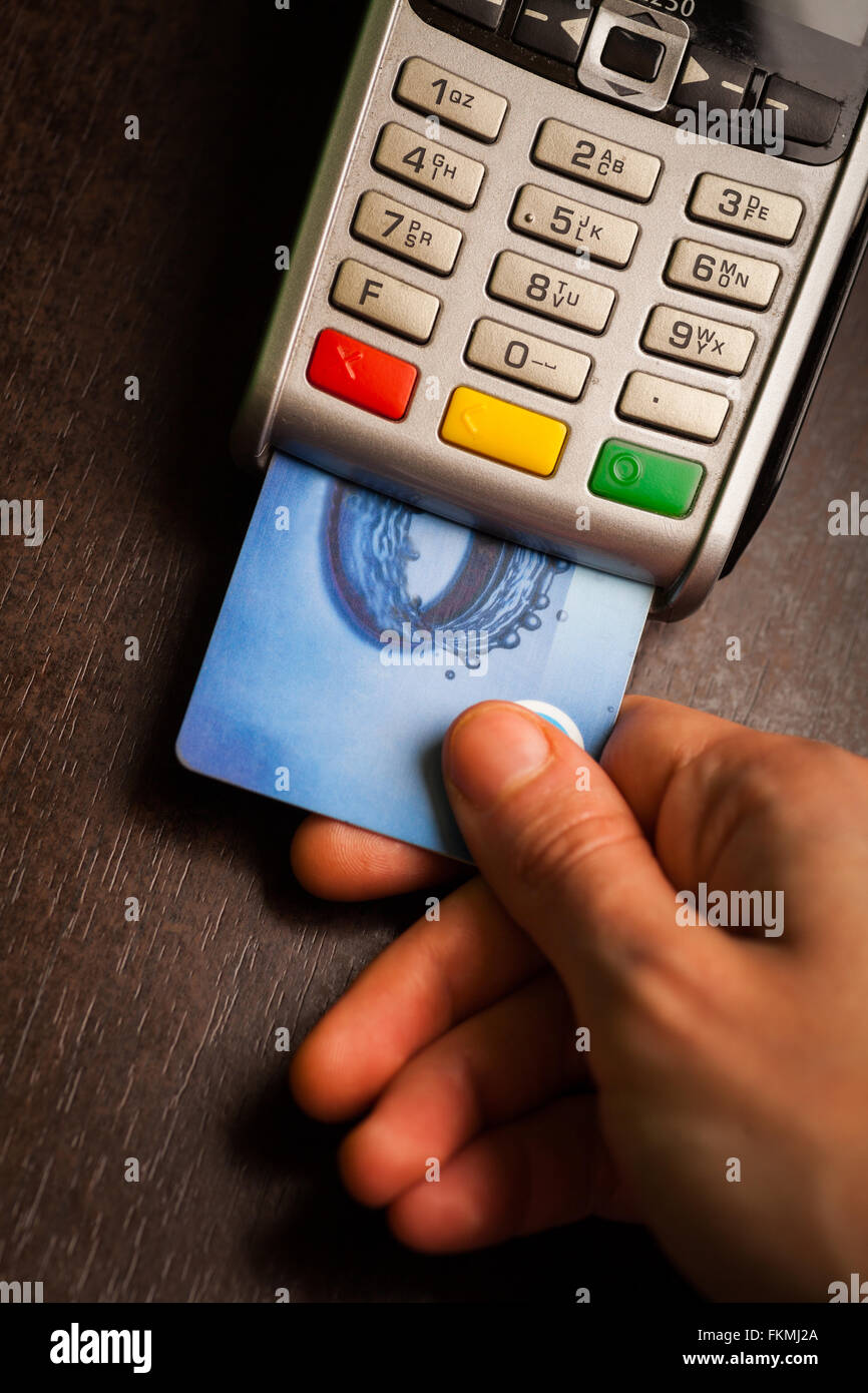 Color image of a POS and credit cards Stock Photo - Alamy