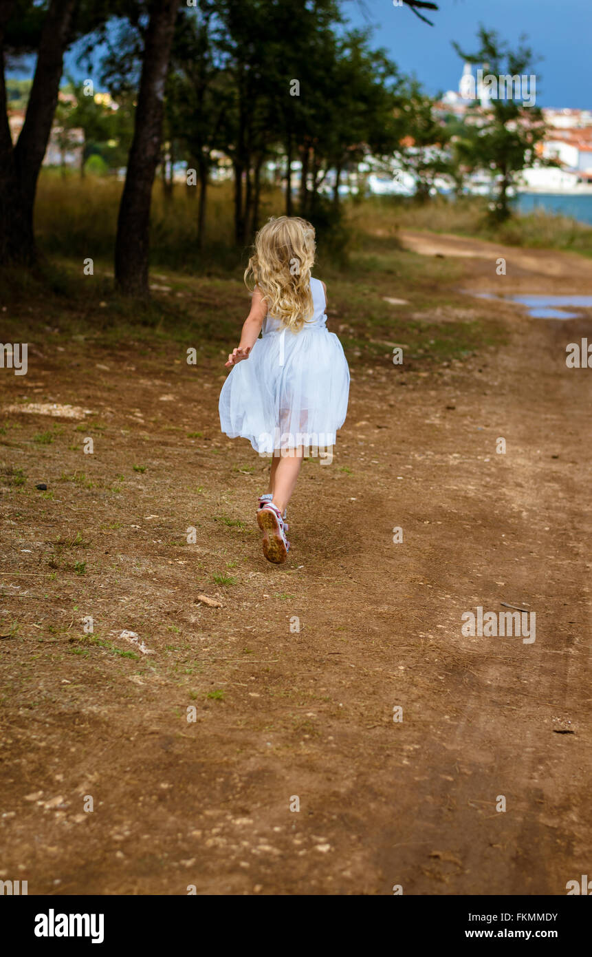 Girl running scared hi-res stock photography and images - Alamy