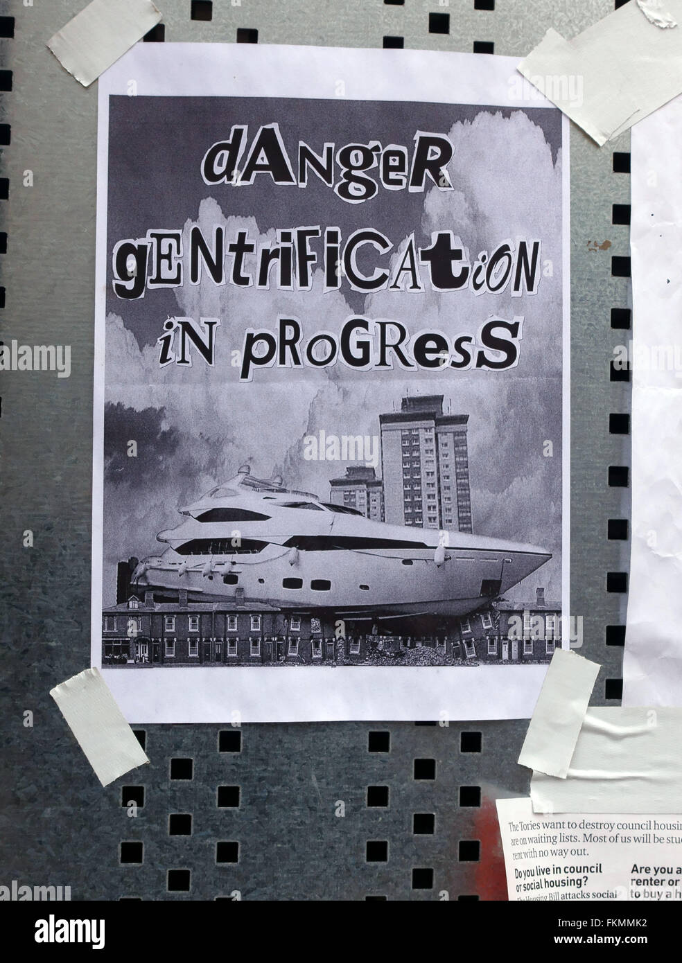 Housing crisis and other political posters on empty shop unit in ...